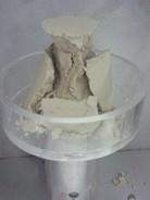 Calibrating DEM simulations of cohesive solids with the Uniaxial Powder ...